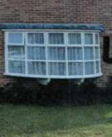 Timber 6 sided bow, outdated and provided restricted views to the garden